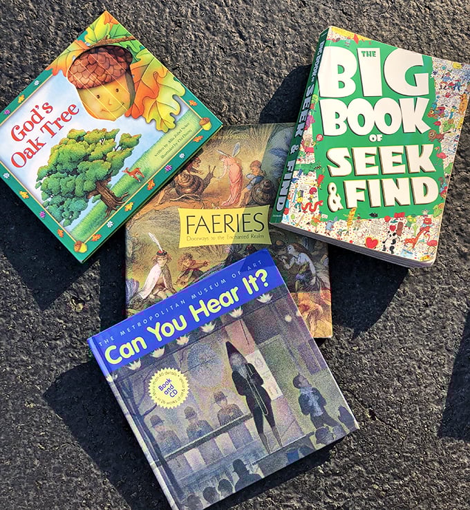 Literary treasures spread across asphalt – children's books that once sparked imagination now ready for their encore performance with new young minds.