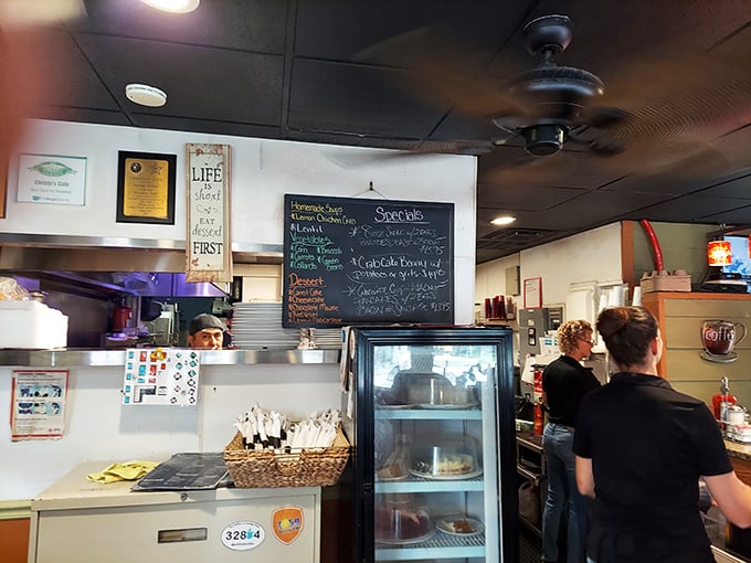 A glimpse into the kitchen where the magic happens, complete with a specials board that changes but never disappoints.