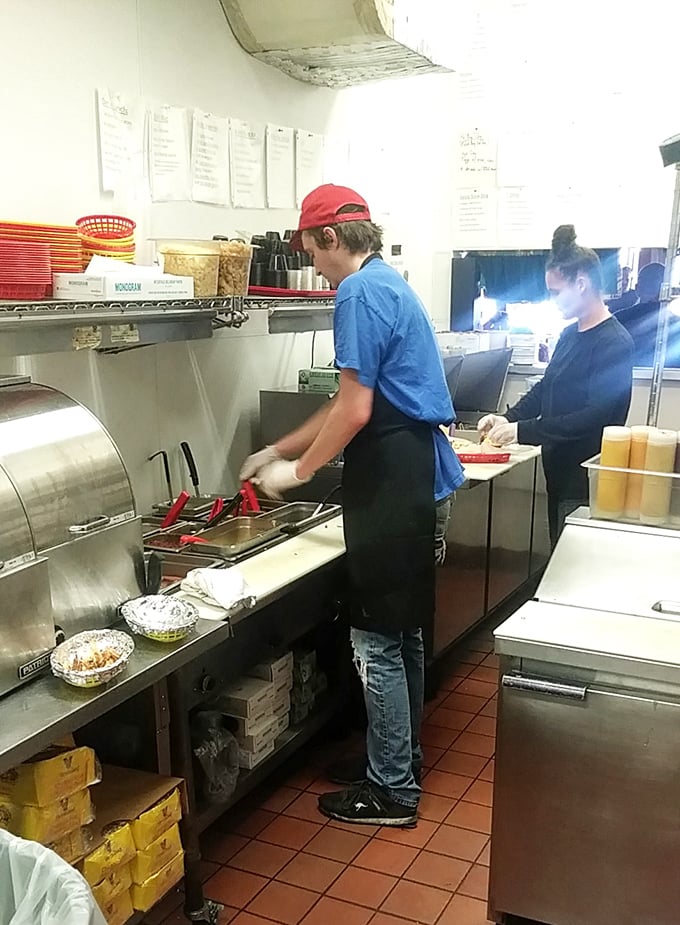 Behind the scenes magic where ordinary ingredients transform into extraordinary creations—the hot dog laboratory where dreams are made.