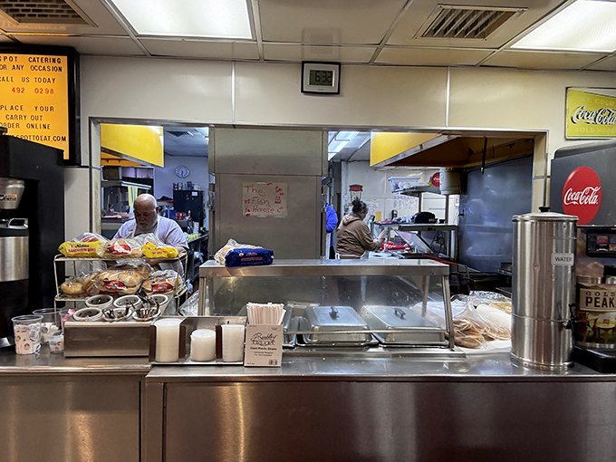 Behind the scenes, the kitchen hums with practiced efficiency—the beating heart that keeps The Spot's culinary traditions alive.