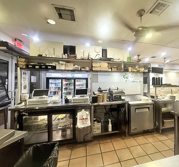 The engine room where Cuban culinary magic happens. Simple equipment, extraordinary results—like a culinary David versus Goliath.