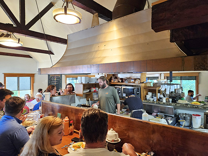 The open kitchen design lets you witness the breakfast ballet—skilled cooks transforming simple ingredients into morning masterpieces.