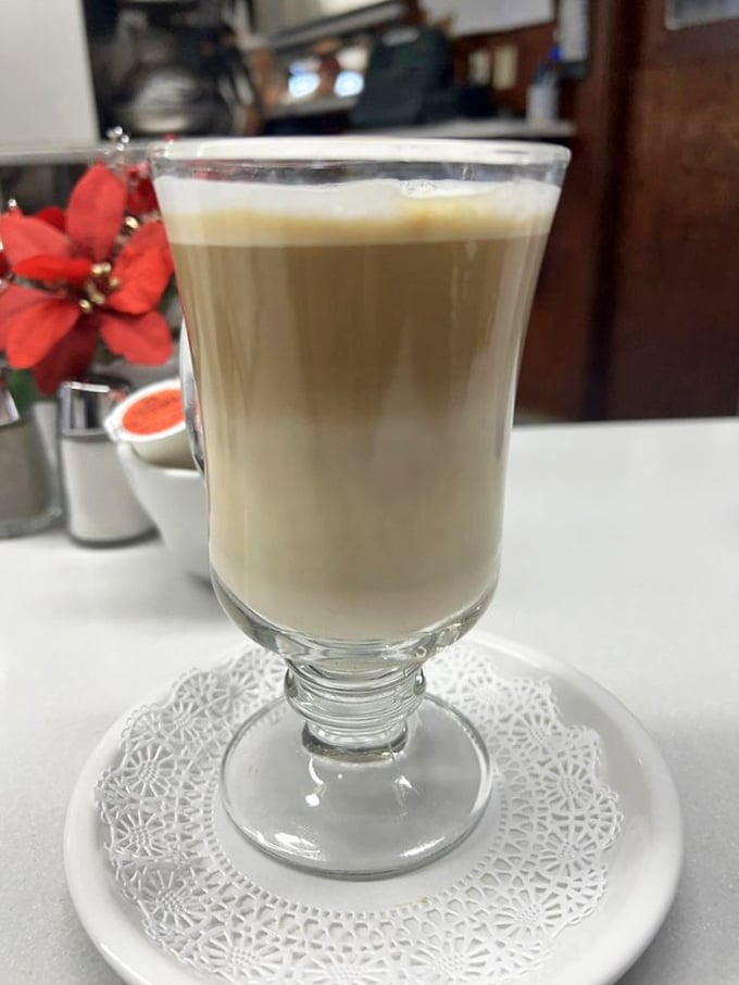 Coffee elevated to an art form. This latte, served with elegant simplicity, promises to jump-start your day with caffeinated sophistication.