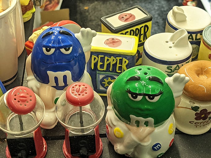 These M&M characters look suspiciously grumpy about their seasoning duties. Perhaps they'd rather be melting in your mouth than on your table.