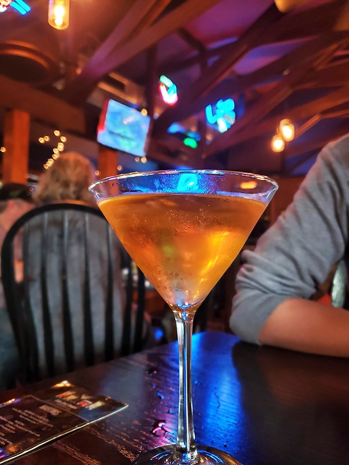 A Manhattan that glows with amber promise under the bar lights—proof that classic cocktails never go out of style.