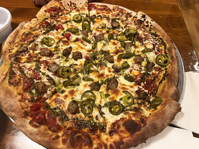 A pizza that's not trying to reinvent the wheel—just perfect it. Those jalapeños add just enough heat to make things interesting.