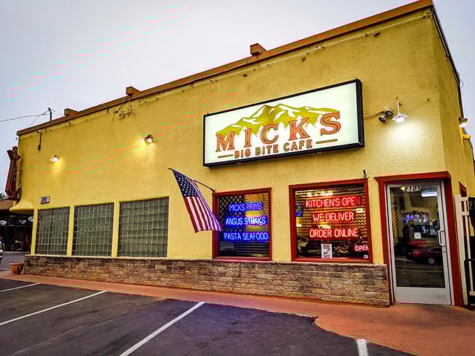 Mick's Big Bite Cafe promises exactly what its name suggests—hearty portions served with a side of small-town hospitality and neon-lit charm.