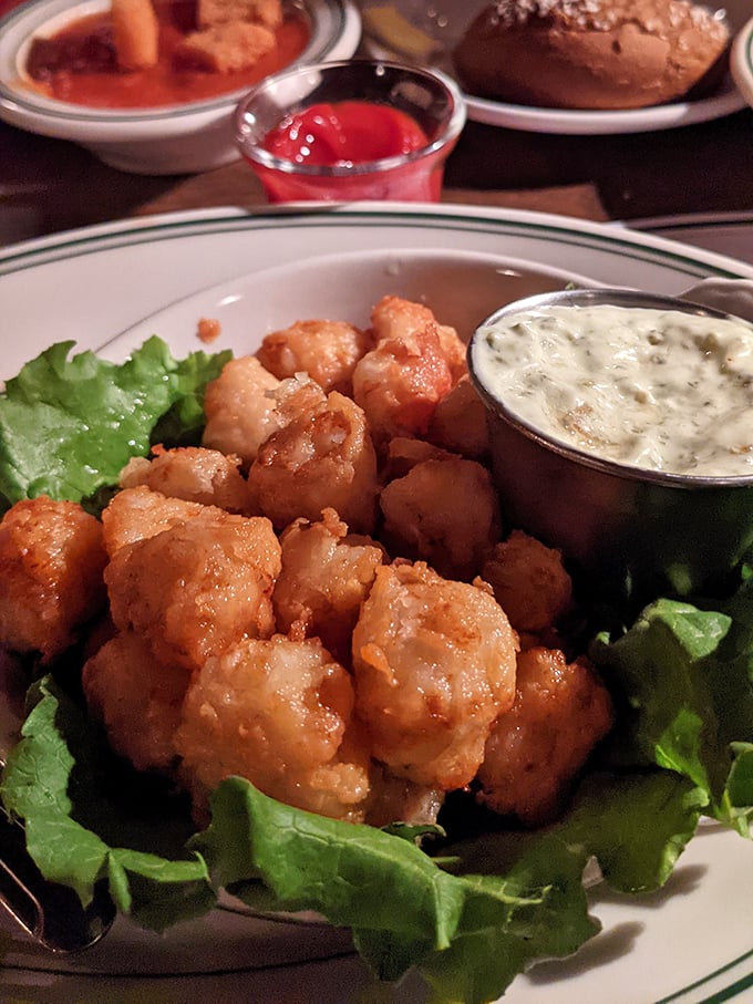 These golden-fried scallops aren't just seafood; they're little crispy treasures that make you wonder why you ever order anything else.