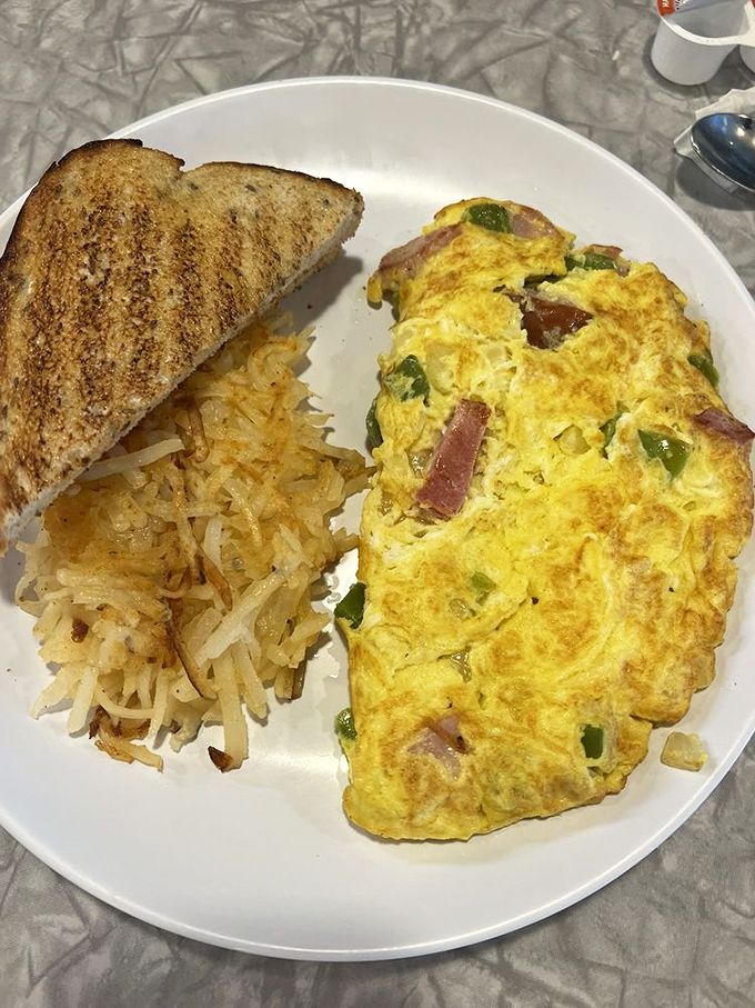 This omelet has more fillings than your last dental appointment, but tastes infinitely better. Those hash browns are the supporting act that could headline.