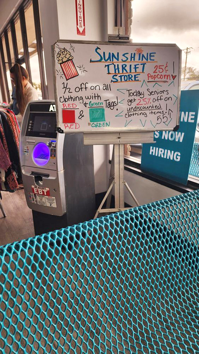 The whiteboard of wonders! A treasure map for savvy shoppers with color-coded tags directing you to maximum savings and 25¢ popcorn.