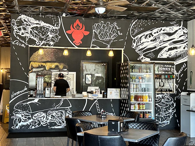 Food art meets function with wall illustrations that tell you exactly what you're in for—a seriously good burger experience.