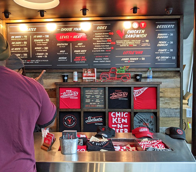 The merchandise wall—where you can take home a souvenir that doesn't require refrigeration. Though the t-shirts might still be spicy.