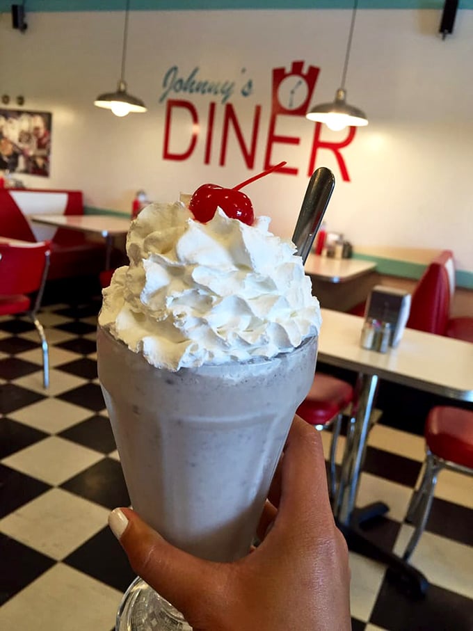 This milkshake doesn't just bring boys to the yard—it brings everyone to Johnny's, topped with enough whipped cream to make a cloud jealous.