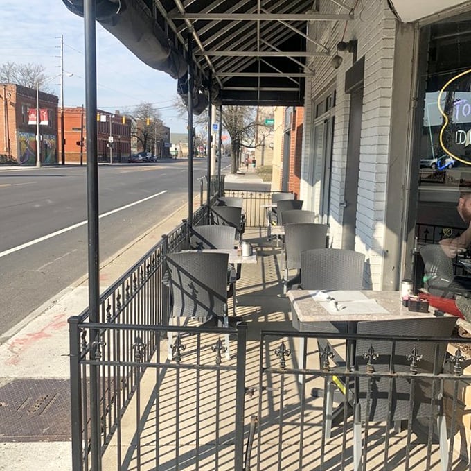Sidewalk seating for those rare Ohio days when the weather behaves – perfect for people-watching with your coffee refill.