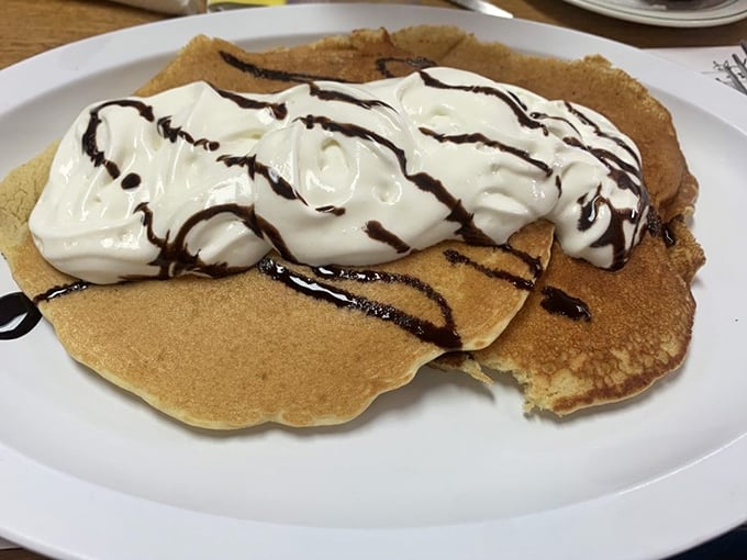 These pancakes with whipped cream aren't just breakfast—they're dessert with permission slips signed by responsible adults.