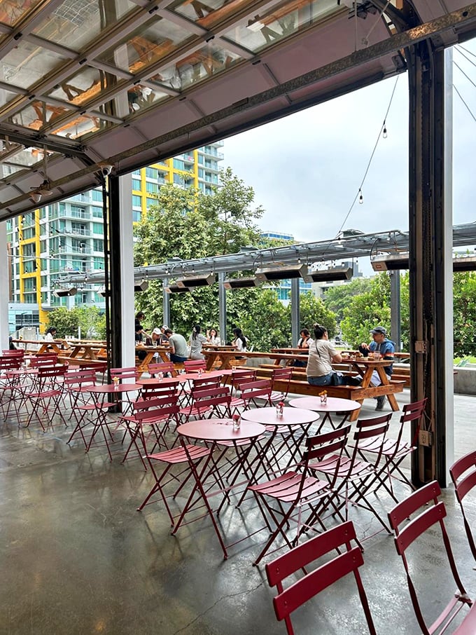 The indoor-outdoor flow creates a space where San Diego's perfect weather becomes part of the dining experience.