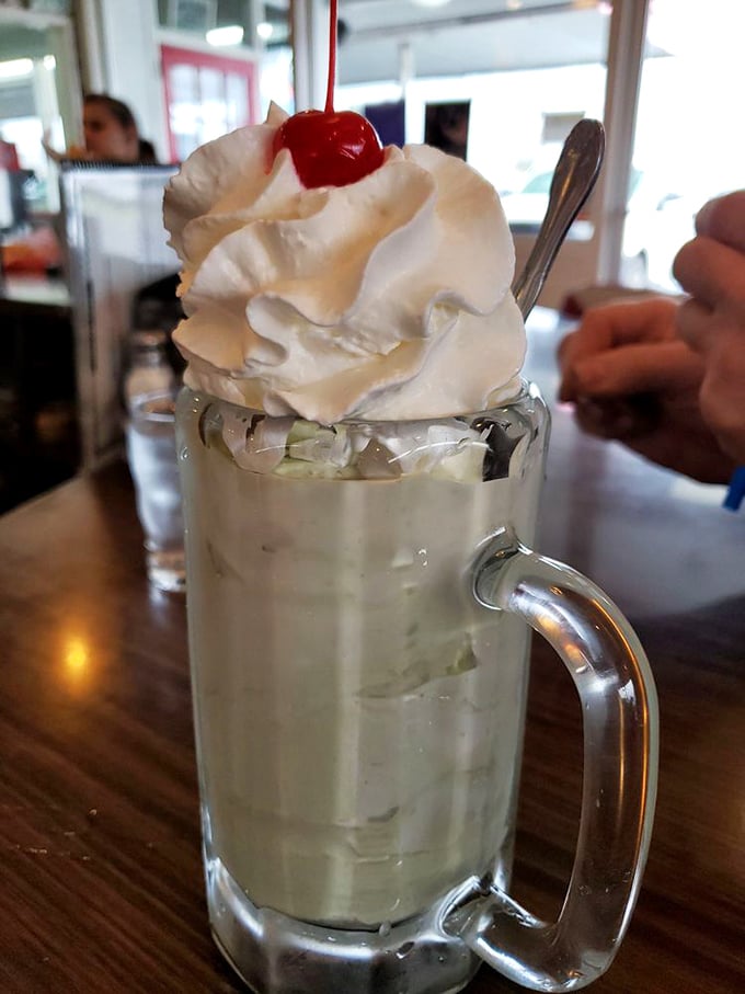 A frosty mug of minty heaven topped with a cloud of whipped cream. This shake doesn't just satisfy—it creates memories with every sip.