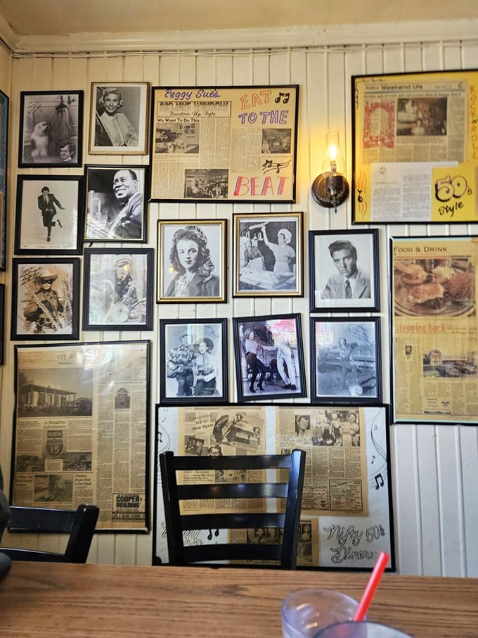 Not just decoration—this wall is a crash course in American pop culture history that pairs perfectly with your meatloaf special.
