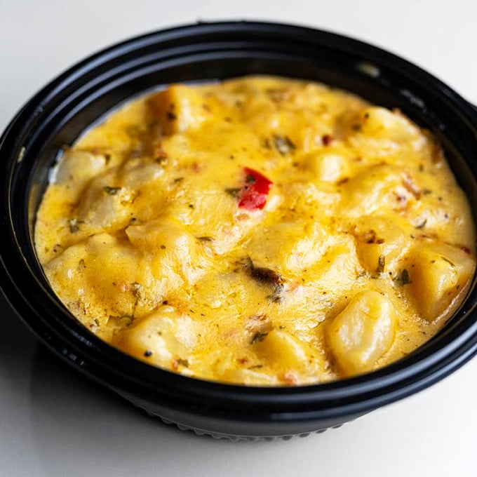 Cheesy potato casserole that bubbles with promise—comfort food that knows its supporting role but still manages to shine. 