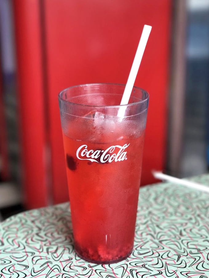 That cherry-red Coca-Cola looks like it belongs in an Edward Hopper painting—the perfect companion to cut through a rich breakfast.