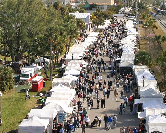 White tents line the street during one of Stuart's many festivals – where local vendors prove Florida culture goes far beyond mouse ears and theme parks.