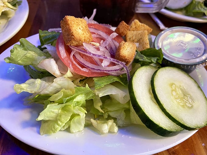 Even the salads at The Whale's Rib refuse to be boring—fresh, crisp, and colorful enough to make you momentarily forget about that dolphin sandwich.