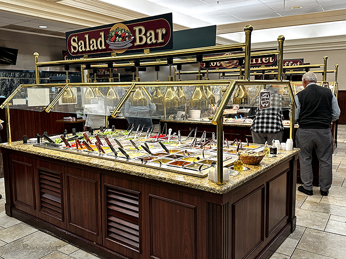 The salad bar: where good intentions meet reality. "I'll just have a salad" quickly becomes "and a little of everything else."