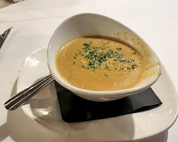 This isn't just soup – it's liquid velvet with seafood essence, the kind that makes you consider drinking straight from the bowl.
