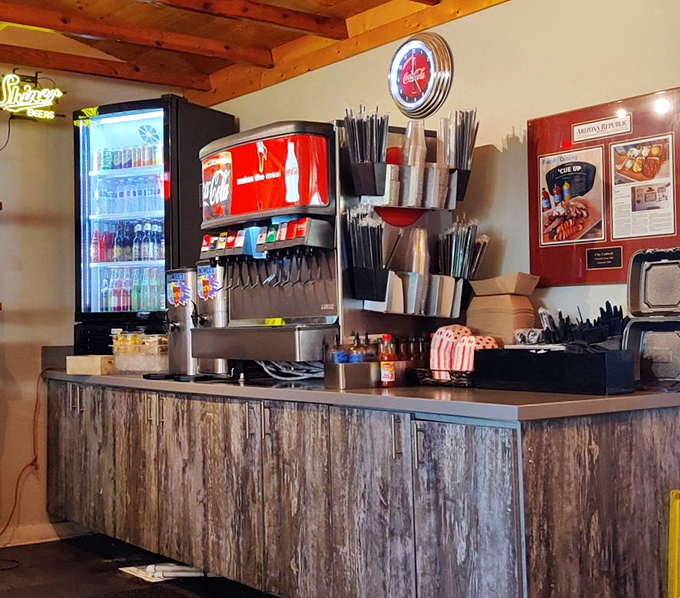 The drink station—where sweet tea flows like liquid gold and Diet Coke provides the perfect palate-cleansing bubbles between bites.