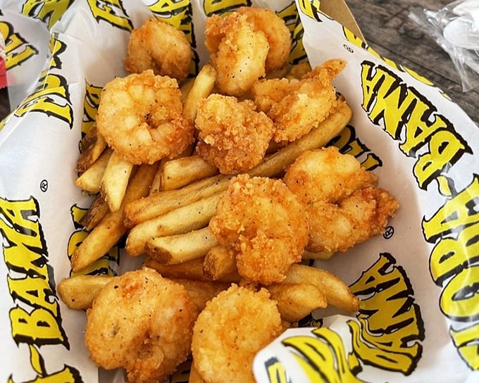 Golden-fried shrimp nestled against crispy fries—a basket of happiness that makes you forget what vegetables even are.