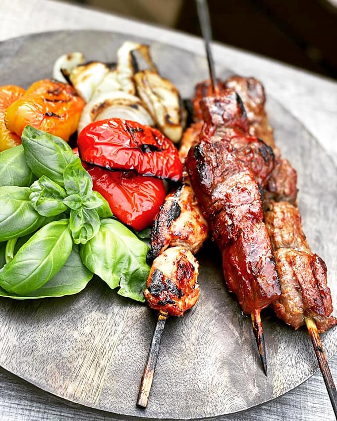 These skewers aren't just food, they're edible exclamation points – grilled to perfection with vegetables that actually make you want to eat vegetables.