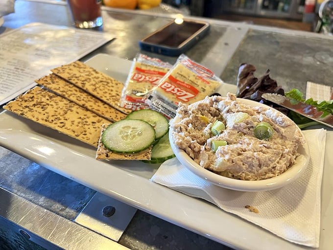Smoked whitefish dip with crackers and cucumber—the sophisticated cousin of tuna salad that makes you feel cultured while you're licking the spoon.