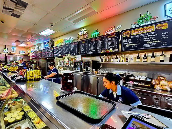 Behind the counter, efficiency meets tradition as staff prepare the sandwiches that have fueled Los Angeles for generations.