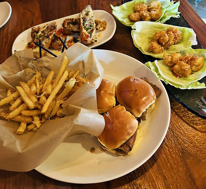 Sliders and fries—proof that sometimes the best things come in small packages, like Danny DeVito or those tiny hotel shampoos.