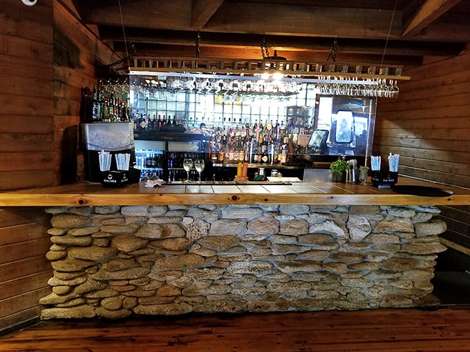 Not just a bar but a work of art—where river stones meet polished wood, creating the perfect stage for rum-based masterpieces.