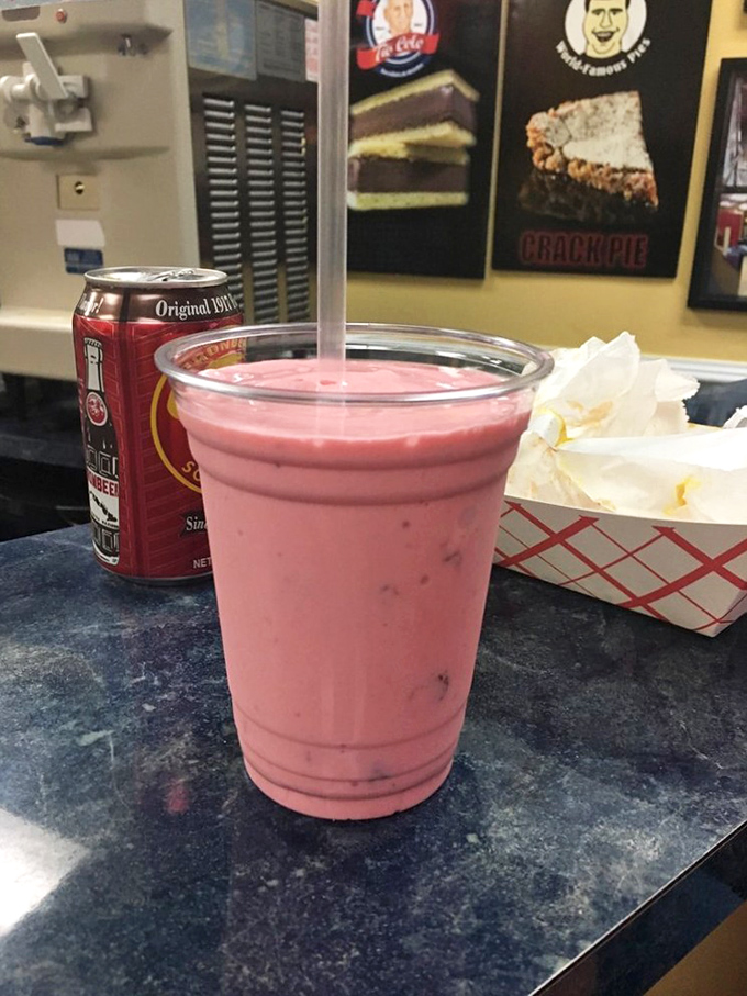 Pink as a Miami sunset, this strawberry shake doesn't just satisfy thirst—it's a sweet vacation in a cup that makes adulting temporarily disappear.