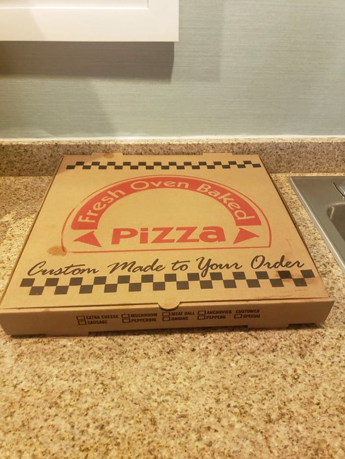 The pizza box – a cardboard treasure chest protecting your precious cargo. Custom-made to your order, because pizza is personal.