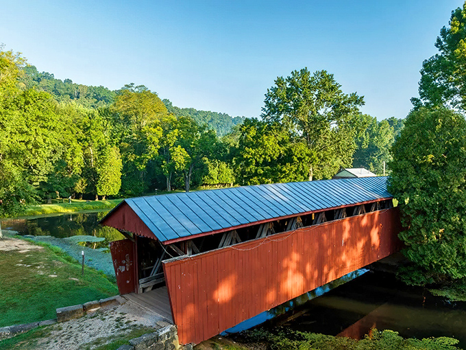 From this angle, you can appreciate how the bridge's metal roof has protected the wooden structure beneath for generations.