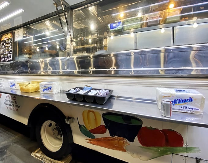 The side of the truck serves as a practical condiment station—proof that great dining experiences don't require fancy silverware.