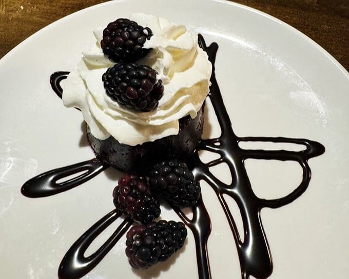 This flourless chocolate cake isn't just dessert—it's an experience dense enough to have its own gravitational pull, yet light enough to disappear in seconds.