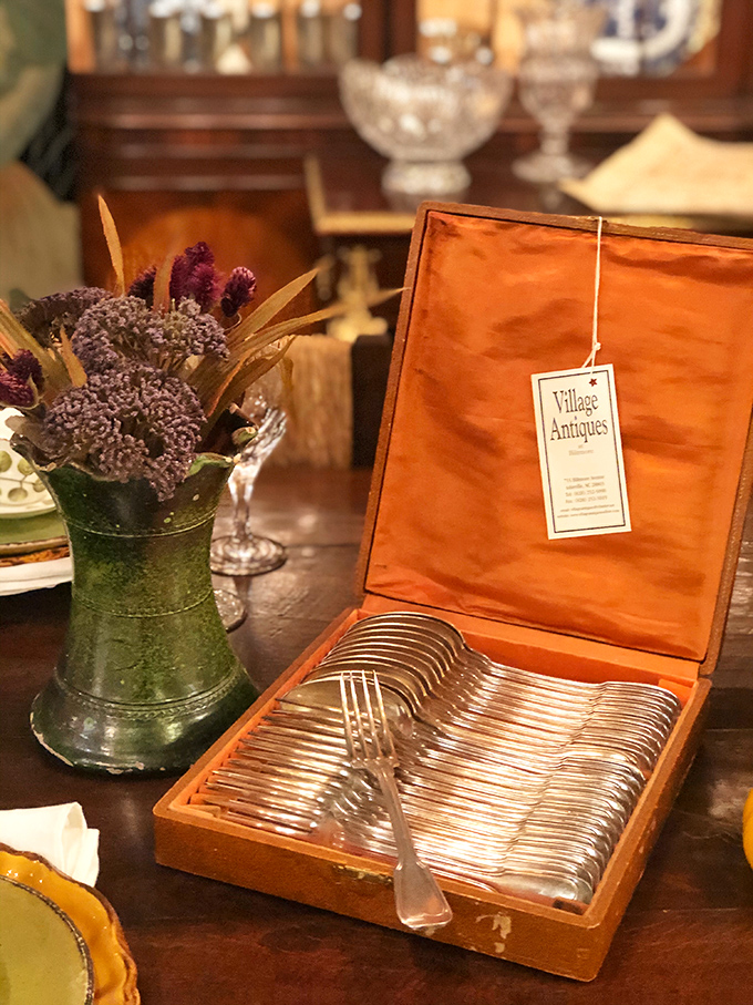 Silver forks that have likely served better meals than anything in my refrigerator. Elegant dining without the hassle of polishing—now that's luxury.