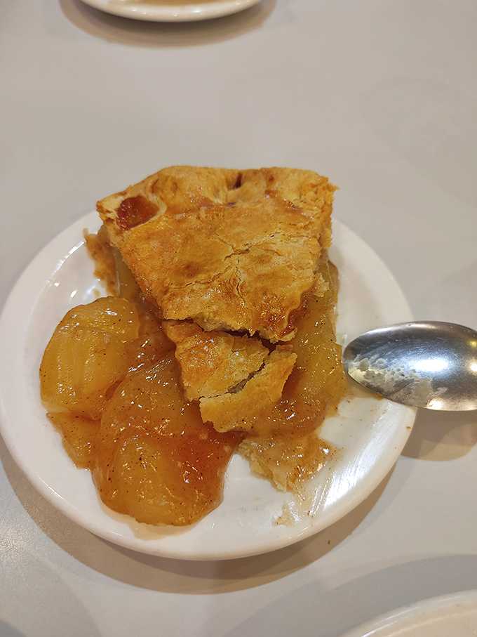 Apple pie that doesn't need to show off—the flaky crust and tender fruit speak volumes without saying a word.