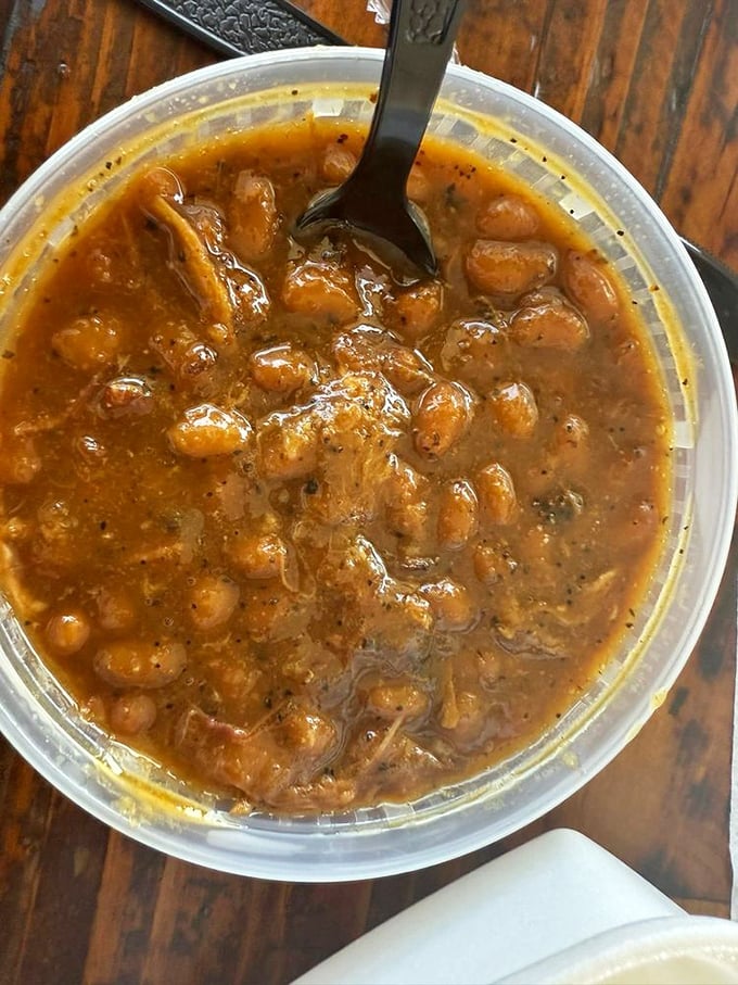 These aren't your campfire beans—they're smoky, savory legumes that have been to BBQ graduate school and graduated with highest honors.