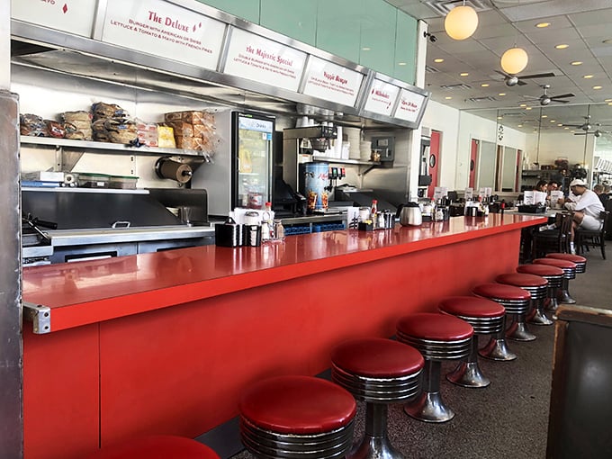 The counter—where solo diners find community, coffee cups are never empty, and the short-order ballet unfolds before your eyes.