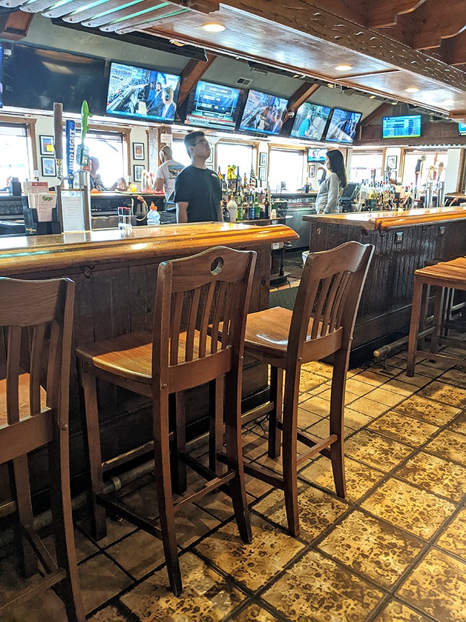 The bar at Mike's isn't just where drinks are served; it's where local stories are exchanged and out-of-towners get schooled in crab-picking techniques.