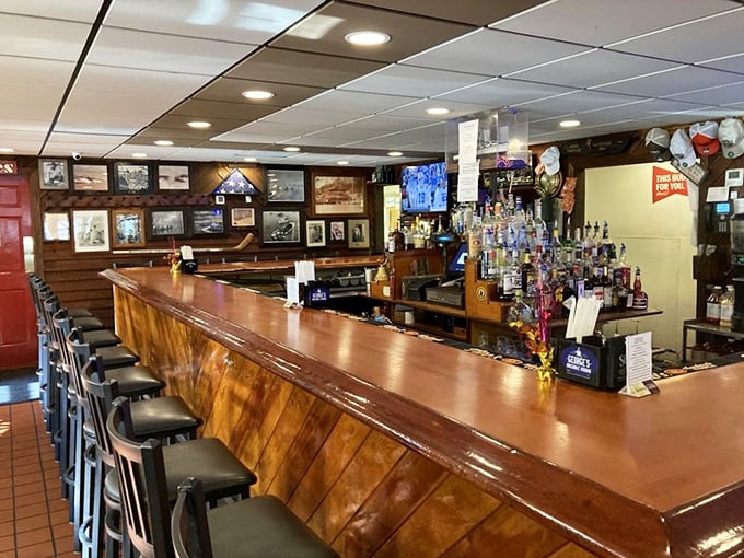 The bar at Cantler's – where cold beer flows freely and the bartenders know exactly what pairs with that pile of shells accumulating before you.