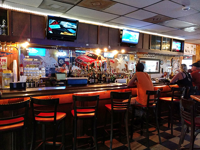 The bar isn't just serving drinks; it's hosting a community – where sports on TV and conversations flow as smoothly as the beer.