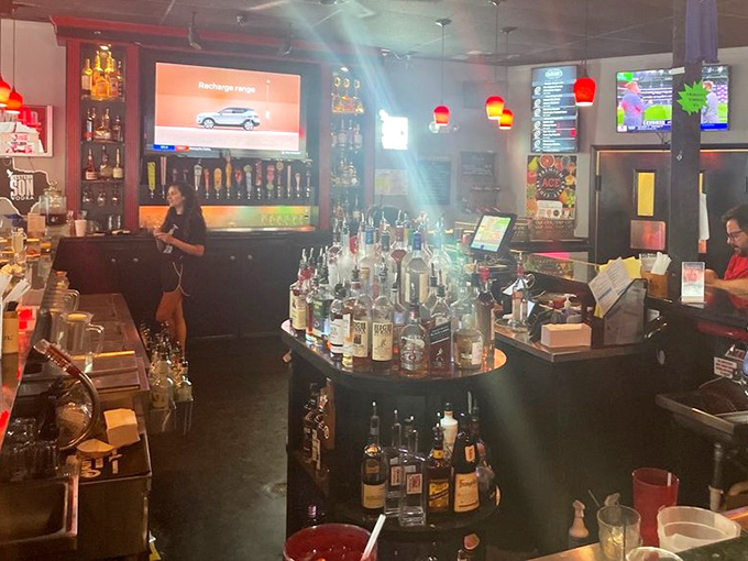 The bar – where strangers become friends, bartenders become therapists, and nobody judges you for ordering that second Cuban sandwich.