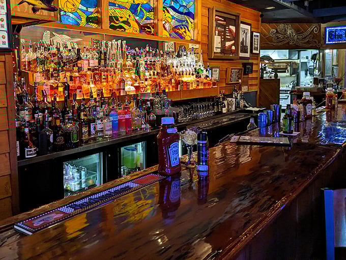 A bar stocked like a pirate's dream. Those stained glass fish overhead seem to be saying, "Stay awhile, the night is young."