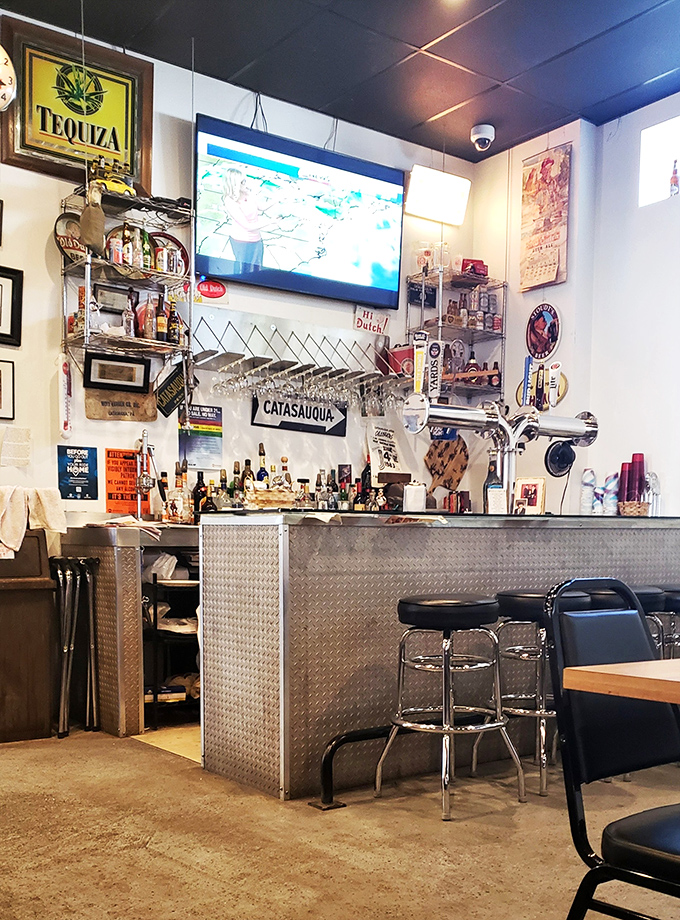 This isn't just a bar counter—it's command central for good times. Where locals gather to debate everything from sports to the best pizza toppings.